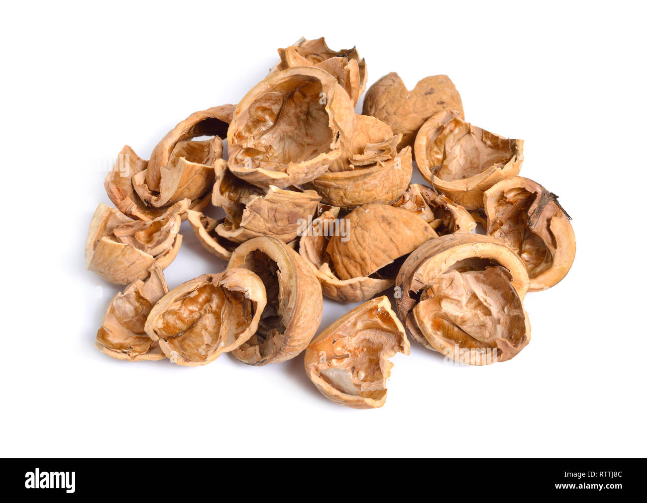 Walnut shells bunch isolated on white background Stock Photo - Alamy