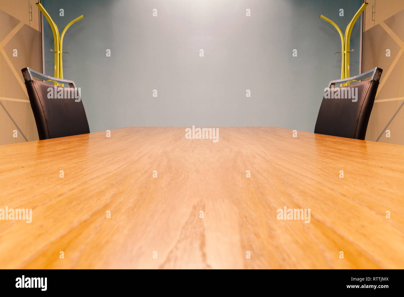 wooden table in conference room, empty space Stock Photo - Alamy