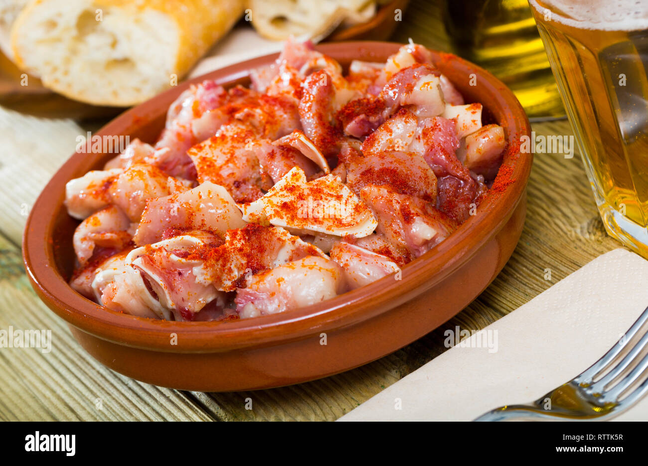 Orejas de cerdo - spanish dish. Roast pigs ears with spice Stock Photo ...