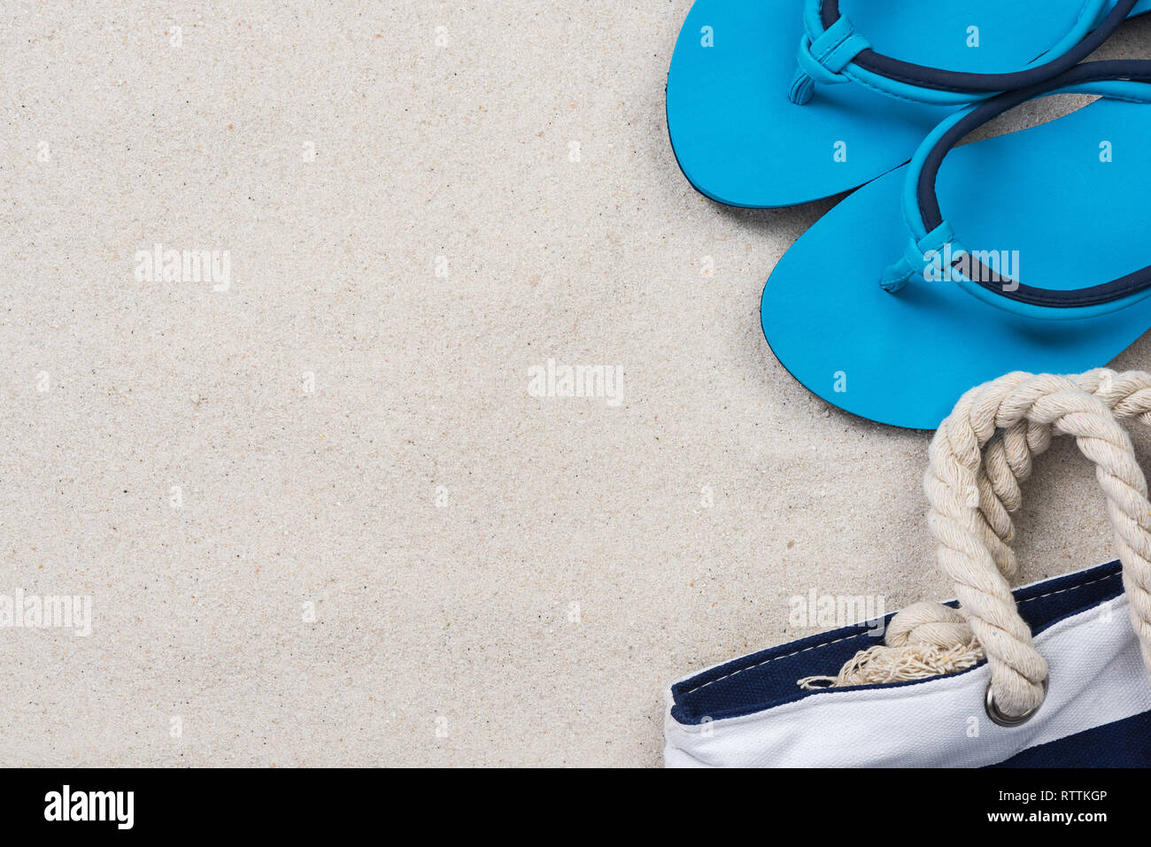 Beachwear and sandals on sandy beach, vacation concept and border ...