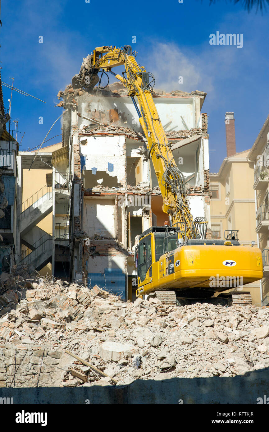 High reach Komatsu demolition Stock Photo - Alamy