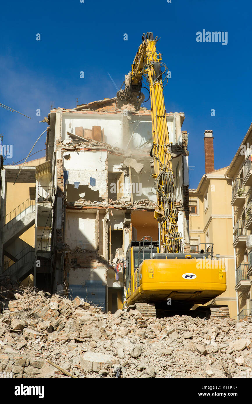 High reach Komatsu demolition Stock Photo - Alamy