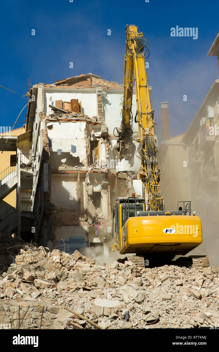 High reach Komatsu demolition Stock Photo - Alamy