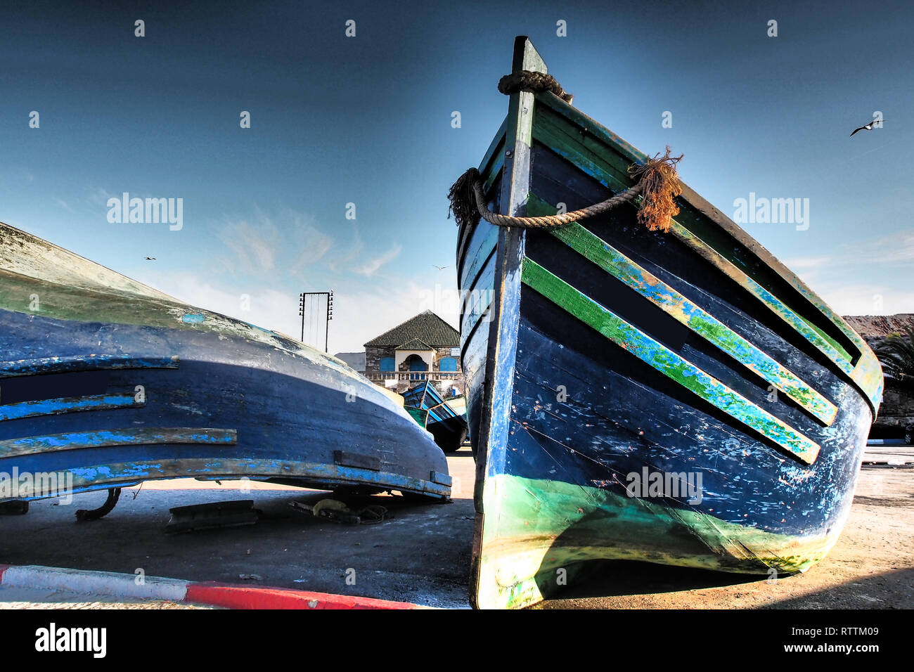 Lots of blue fishing boats in the port of Essaouira, Morocco in Africa ...