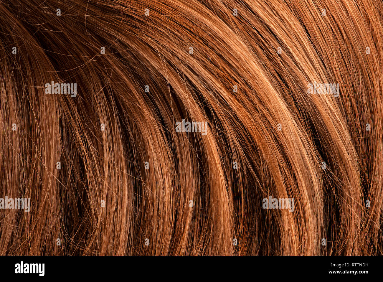 Wavy red human hair background Stock Photo - Alamy