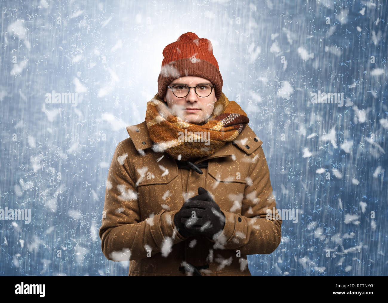 Handsome young boy shivering and trembling at snowstorm concept Stock ...