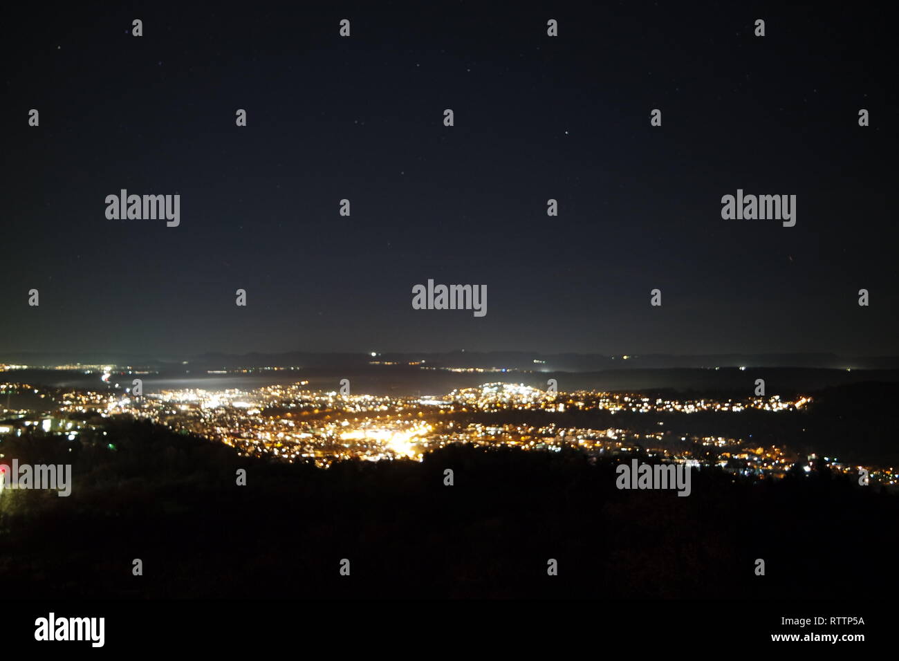 Town at night Stock Photo - Alamy