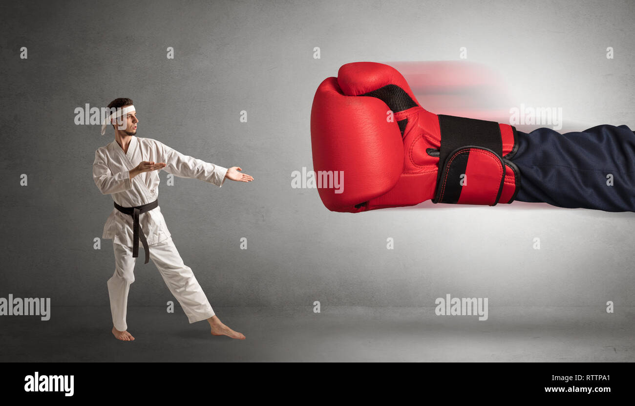 Big man little man fight hi-res stock photography and images - Alamy