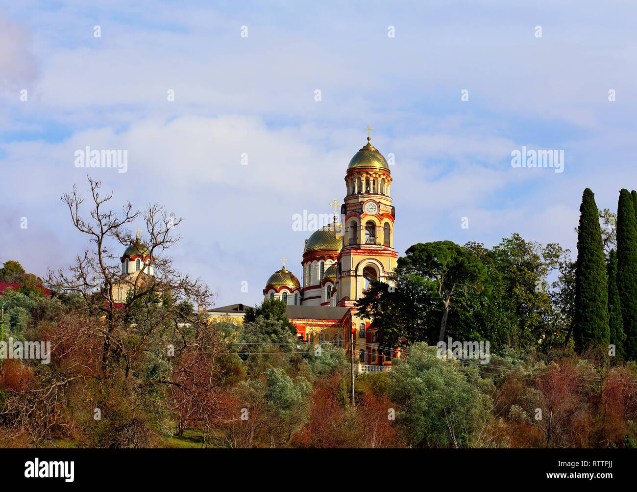 Old time monastery on a hill among cypresses Stock Photo - Alamy