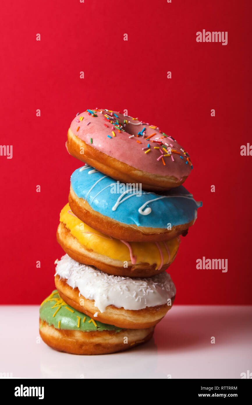 Stacked chocolate donuts hi-res stock photography and images - Alamy