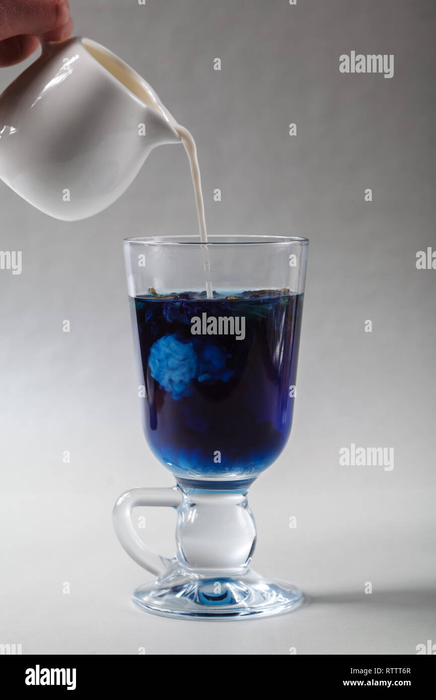 Milk mixing into tea hi-res stock photography and images - Alamy