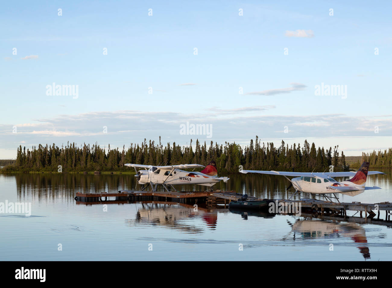 Float planes at the jetty of Gangler's Lodge in northern Manitoba ...