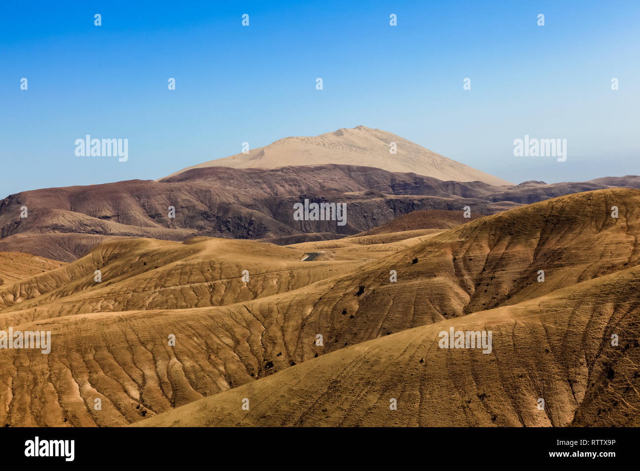 Desert and eroded area of the Peruvian Andes, Ica region and white hill ...