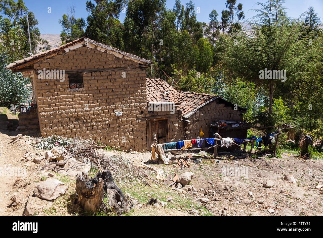 Adobe house with roof of tiles, typical of the rural area of Peru Stock ...