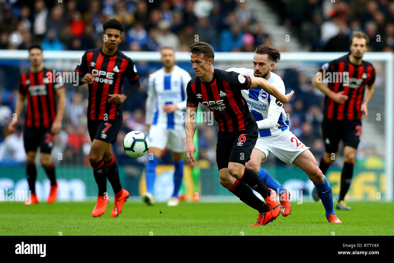 Huddersfield Town's Jonathan Hogg (left) and Brighton & Hove Albion's ...