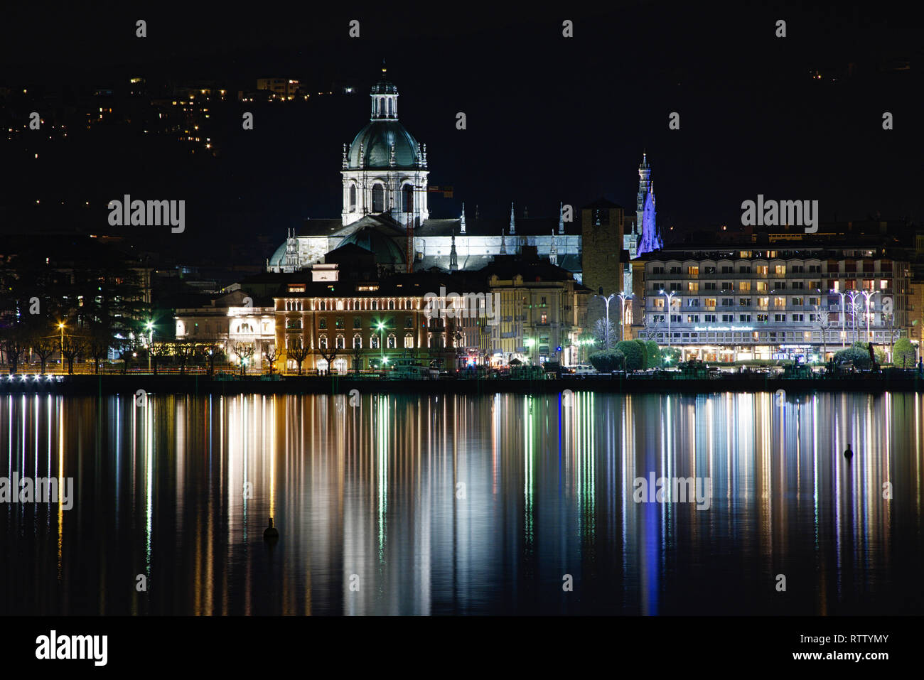 Nightscape in Como with its cathedral and thousand lights that are ...