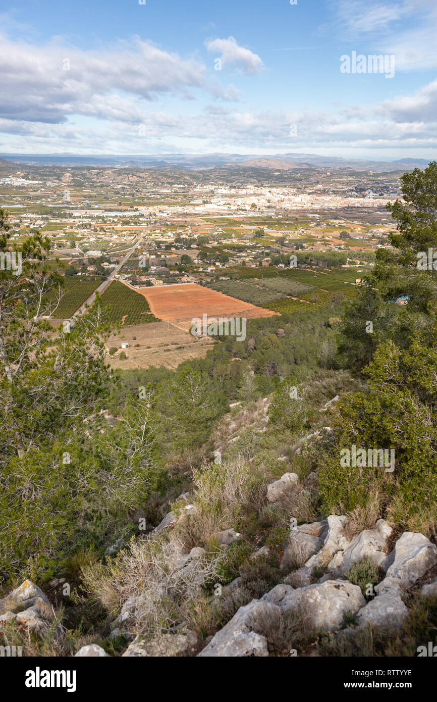 A view of rural farmland area from mountains in Spain. Small town in ...