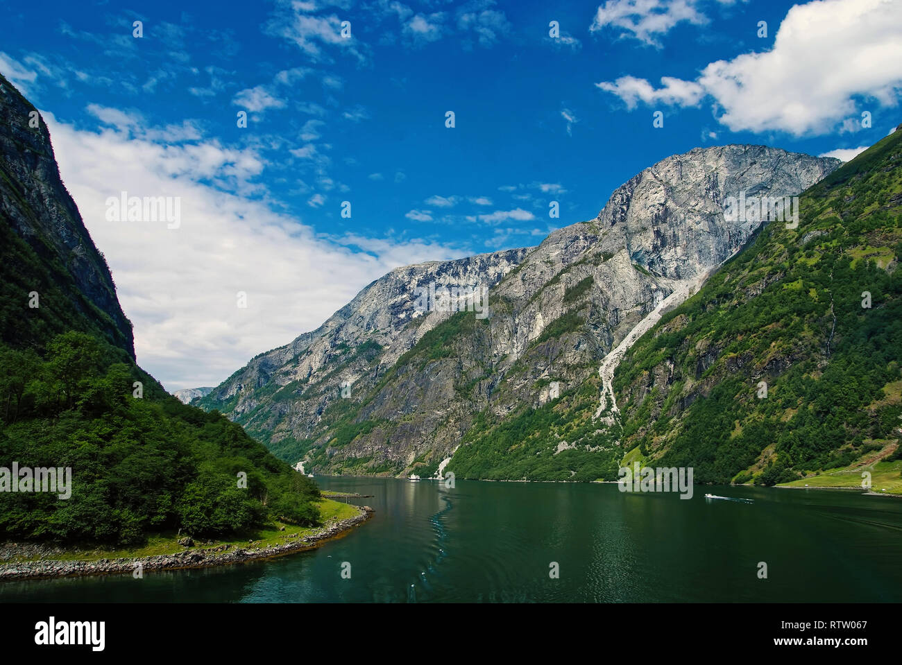 norway. Water between mountain cliffs with ships norwegian fjords ...