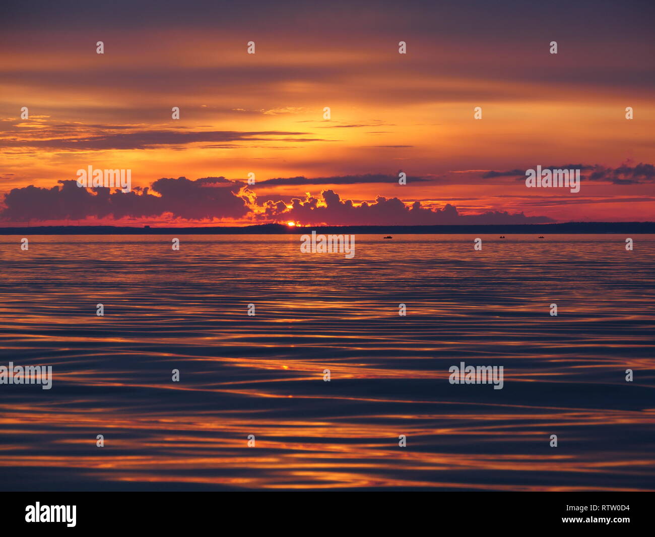 Red dramatic sunset on the sea Stock Photo - Alamy