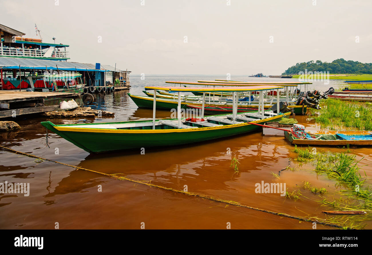Motorboats or boats moored at sea shore in manaus, brazil. Water ...