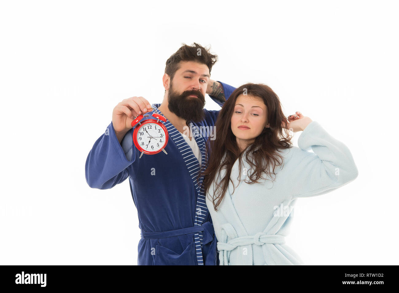 Couple awakening hold alarm clock. Family morning routine. Create ...