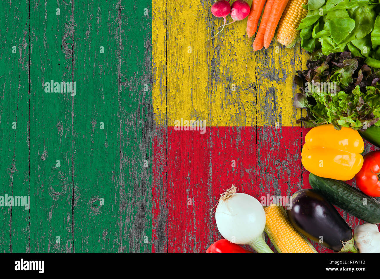 Fresh vegetables from Benin on table. Cooking concept on wooden flag ...