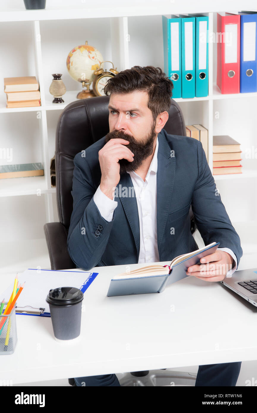 Busy boss in office. Check if i have time today. Man bearded hipster ...