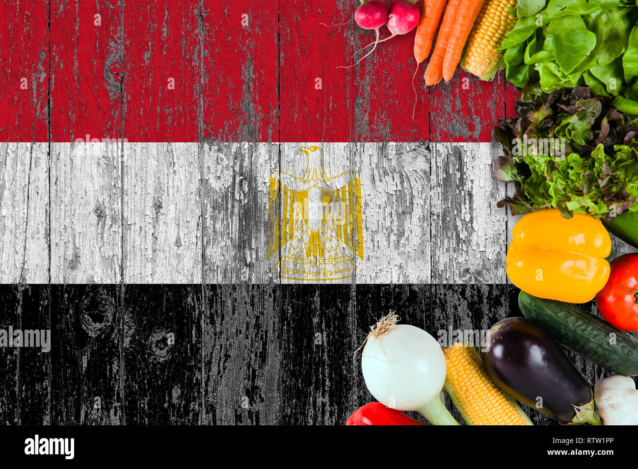Fresh vegetables from Egypt on table. Cooking concept on wooden flag ...