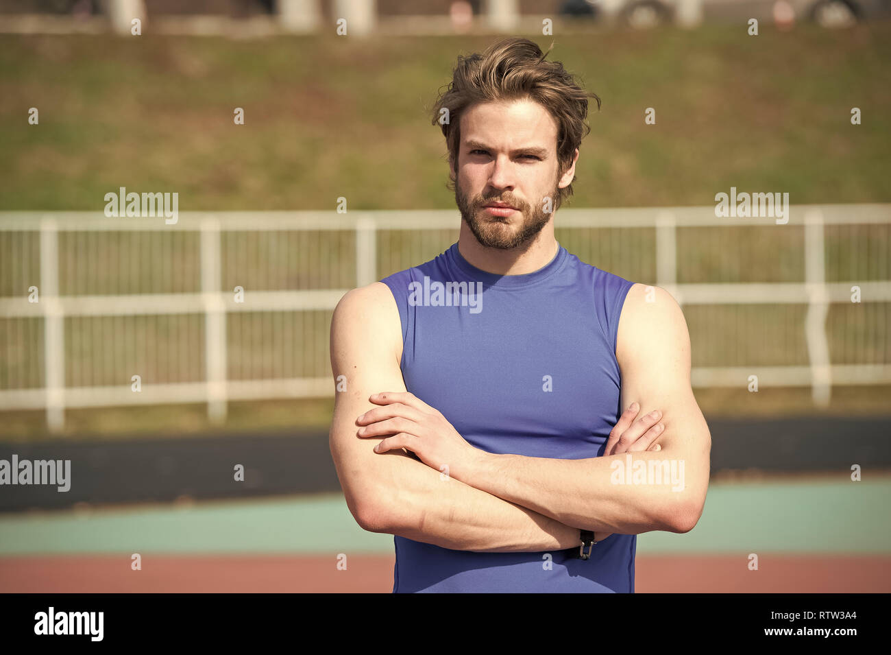 Focused on sport achievement. Confident athlete sportsman. Man blue ...