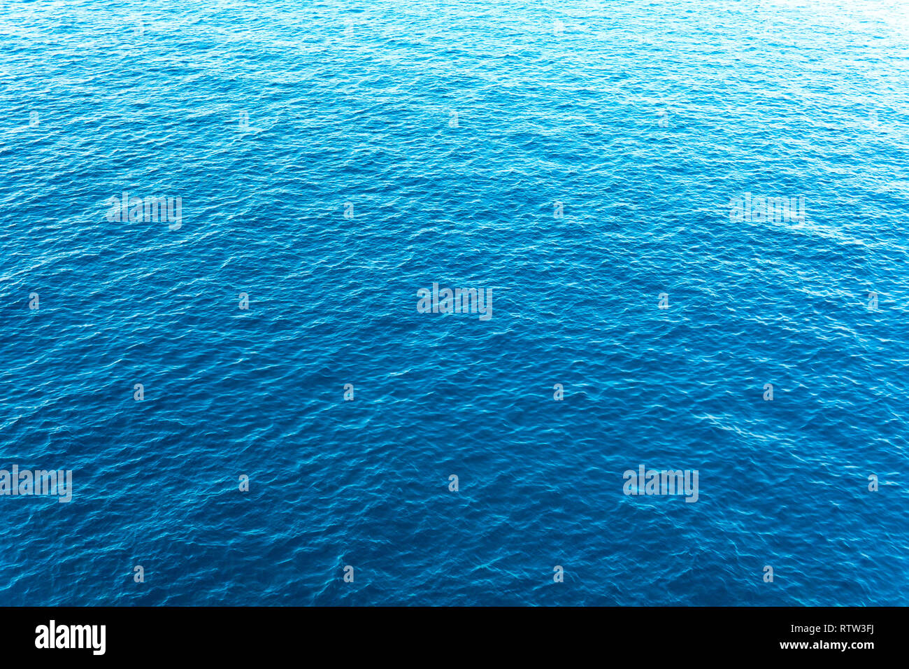 Blue blue patterned sea surface, top View Stock Photo - Alamy