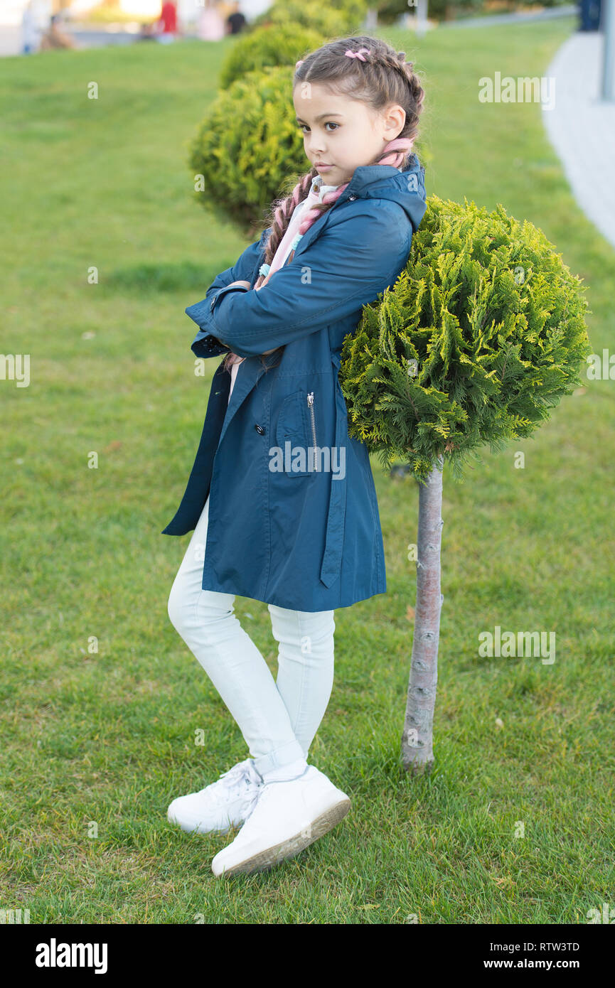 Must have concept. Fashionable coat. Girl cute face braided hair posing ...