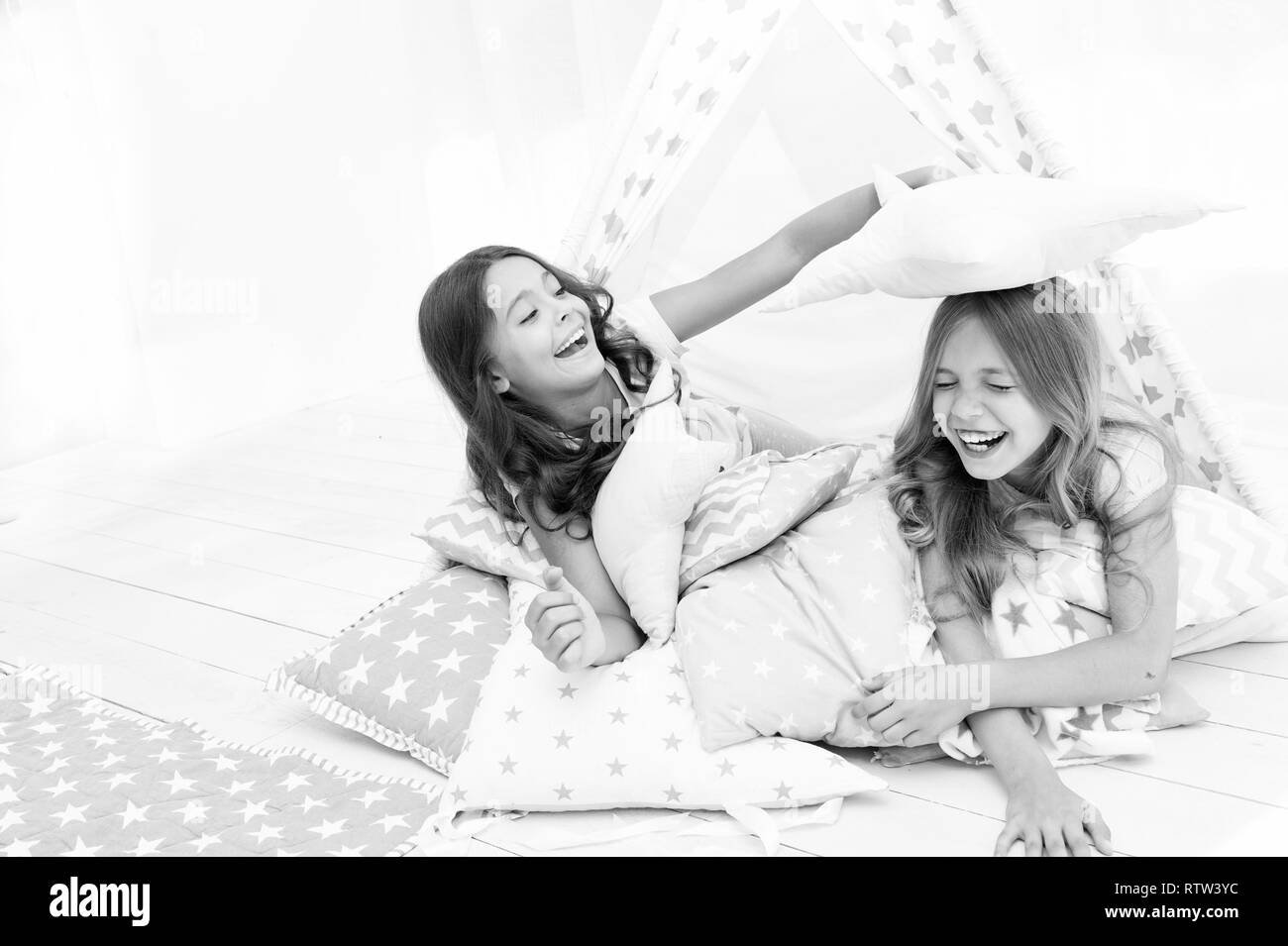 Pajamas party for kids. Girls having fun tipi house. Girlish leisure ...