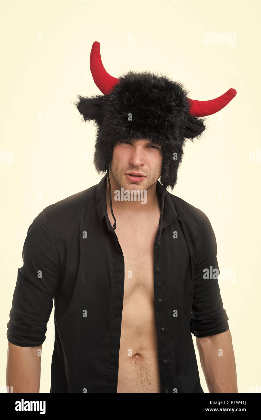 Keep cool and maintain composure. Man horns as devil or bull. Ignore ...