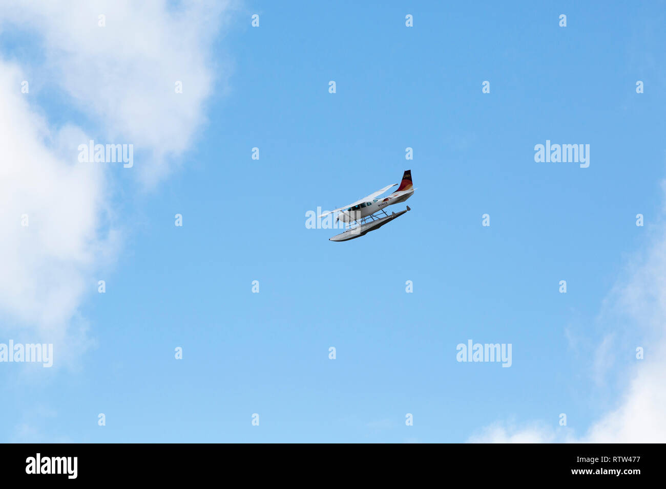A float plane flying in northern Manitoba, Canada. Lodges operate fly ...