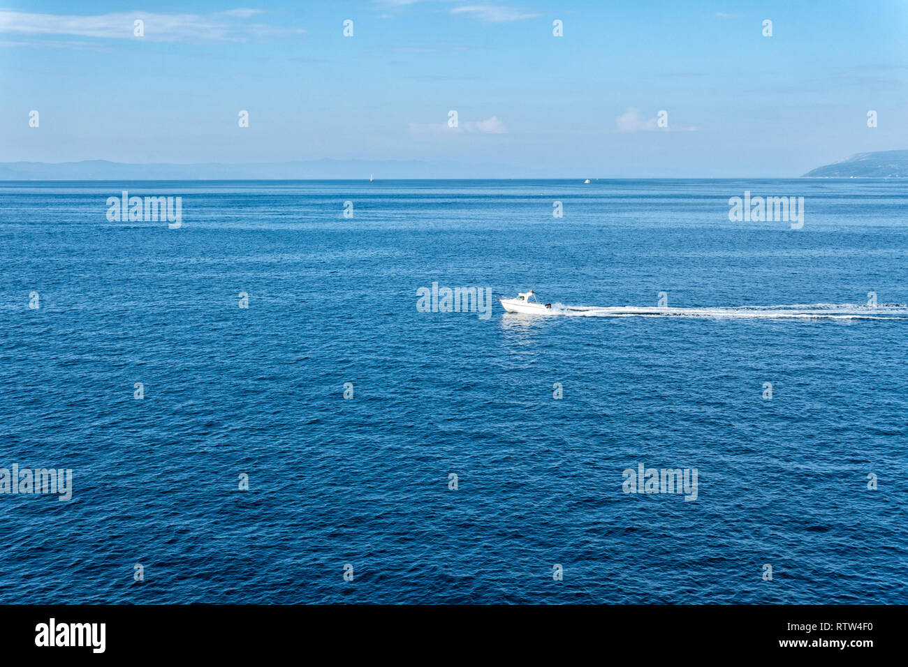 white tourist boat on the open sea Stock Photo - Alamy