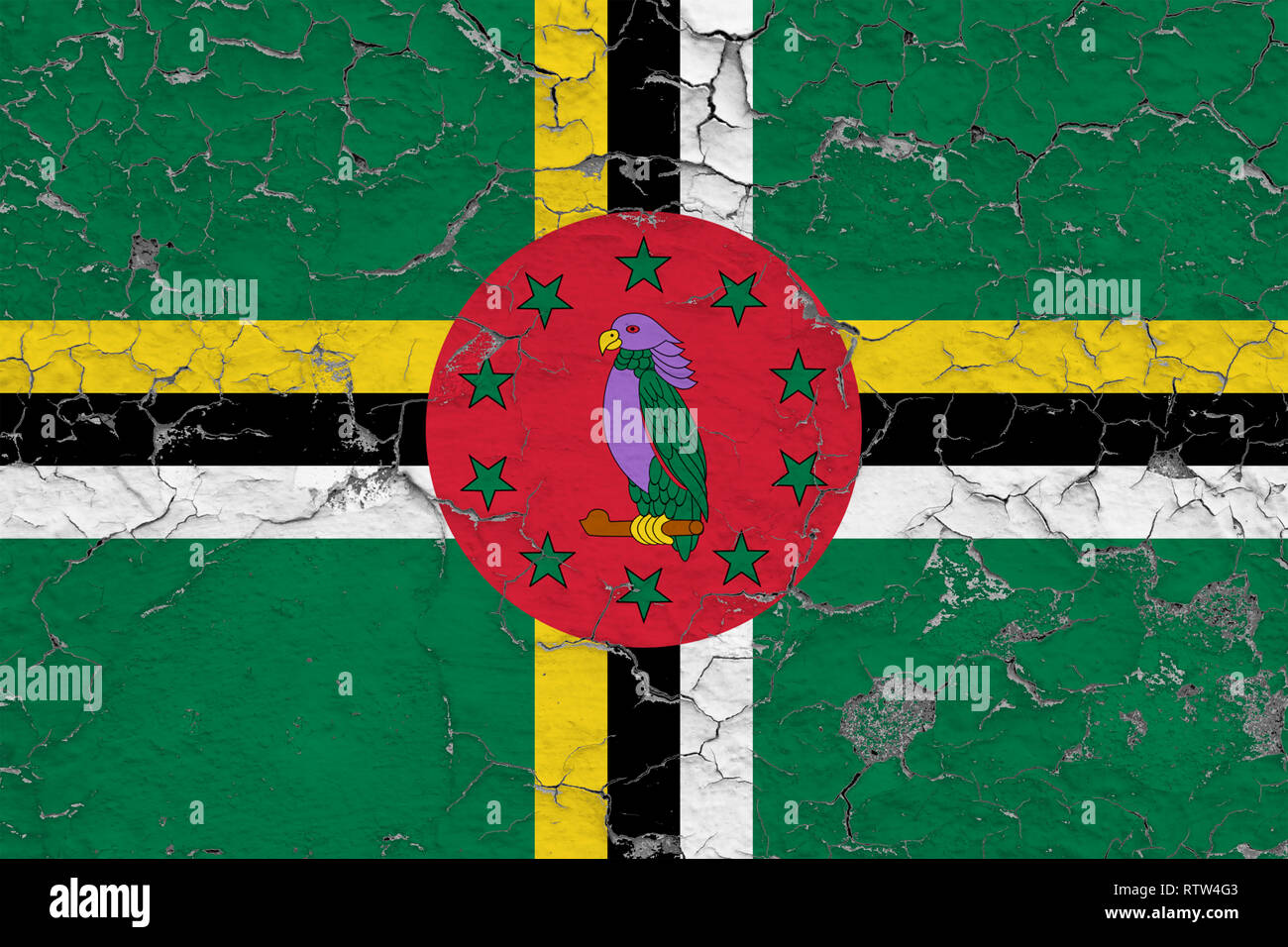 Flag of Dominica painted on cracked dirty wall. National pattern on ...