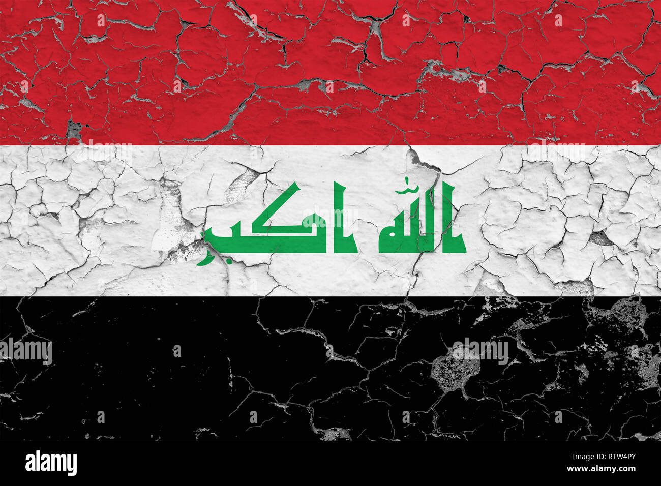 Flag of Iraq painted on cracked dirty wall. National pattern on vintage ...