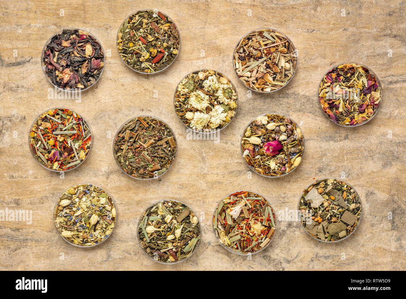 collection of twelve herbal blend Chinese tea in round bowls (Petri ...