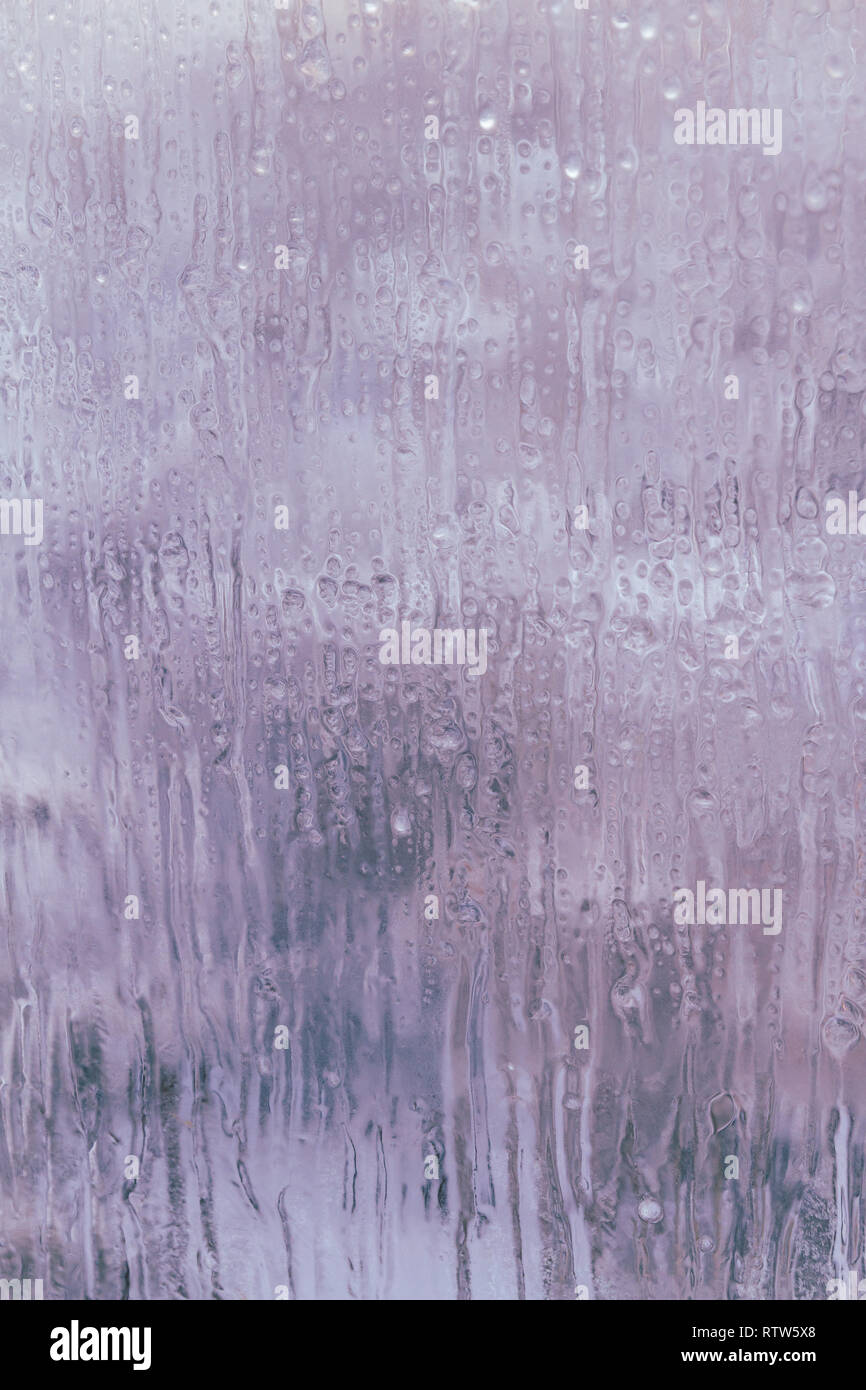 Frozen window in winter with drops and drips Stock Photo - Alamy