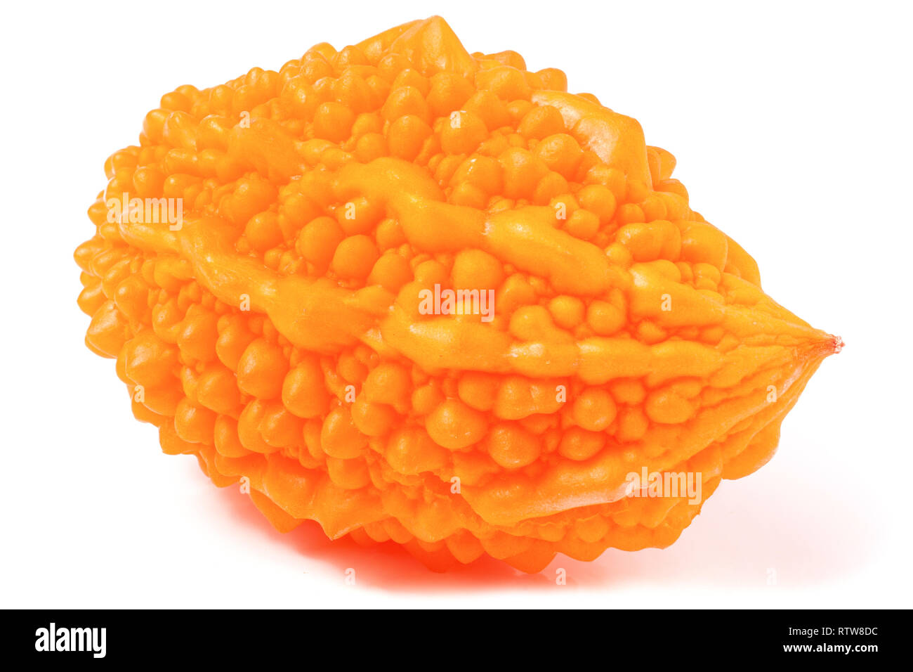 one yellow bitter melon or momordica isolated on white background Stock ...