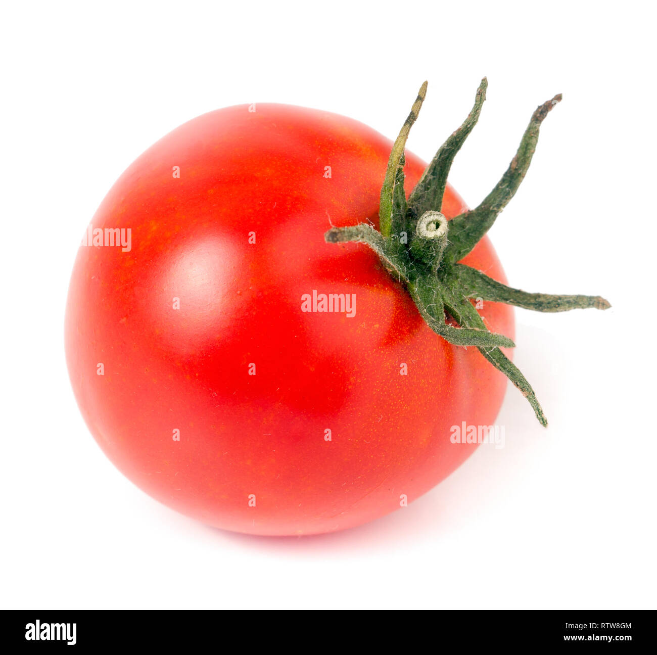 One tomato isolated on a white background Stock Photo - Alamy