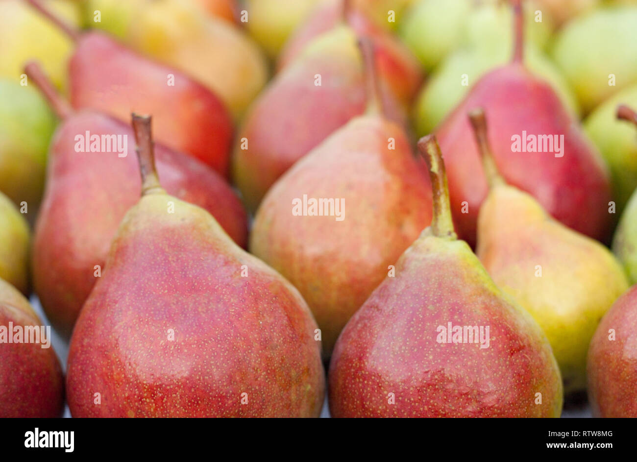 pears on the counter market as background Stock Photo - Alamy