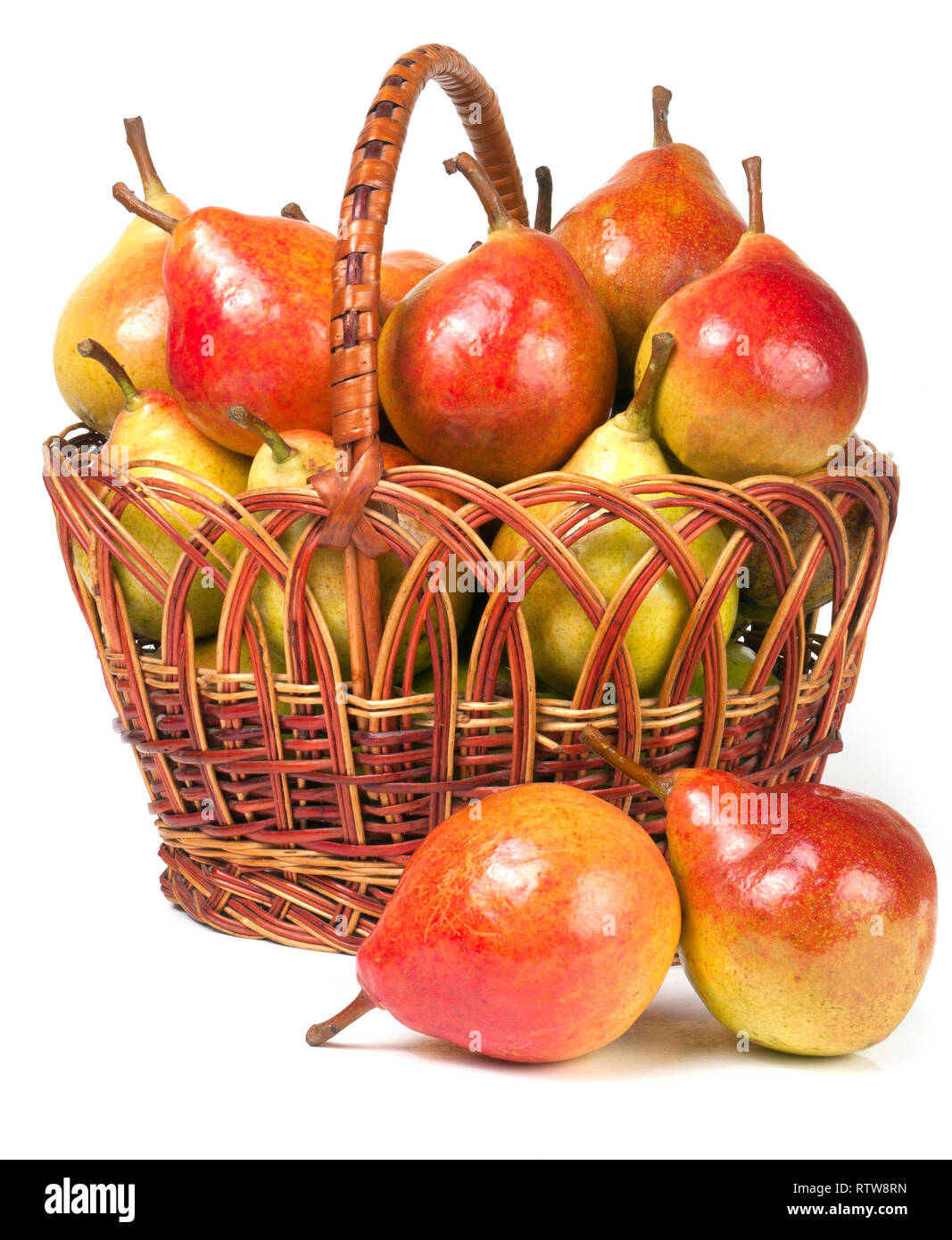 pears in a wicker basket isolated on white background Stock Photo - Alamy