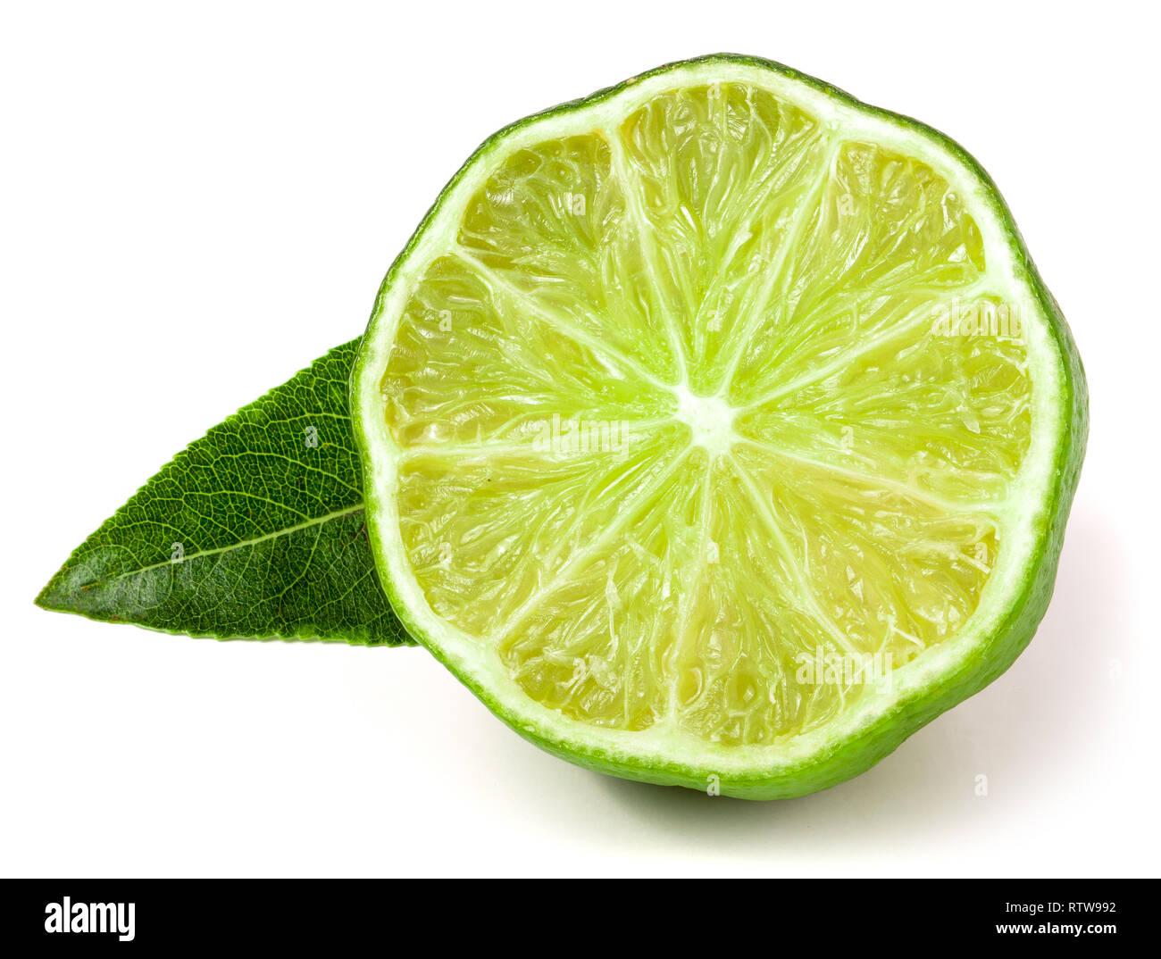 Lime half with leaf isolated on white background Stock Photo - Alamy