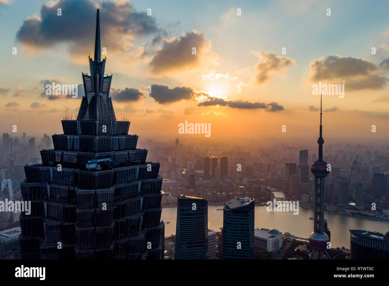 Sunset of Shanghai Skyline And Skyscrapers. Silhouette Of Oriental ...
