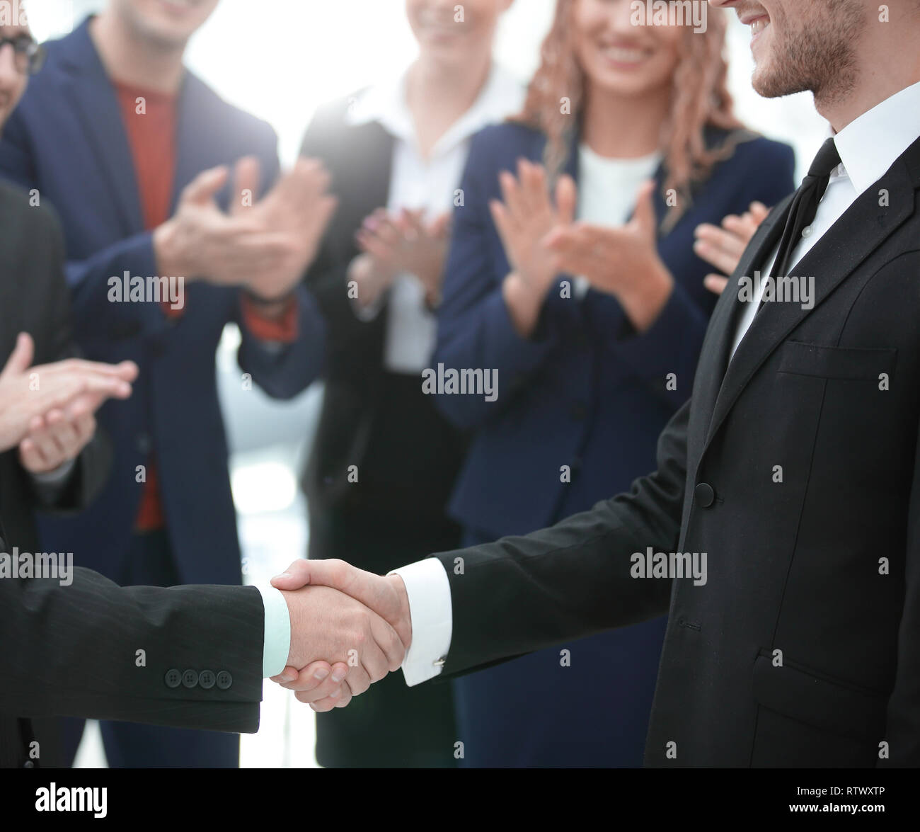 close up. handshake of business partners on the background of ...