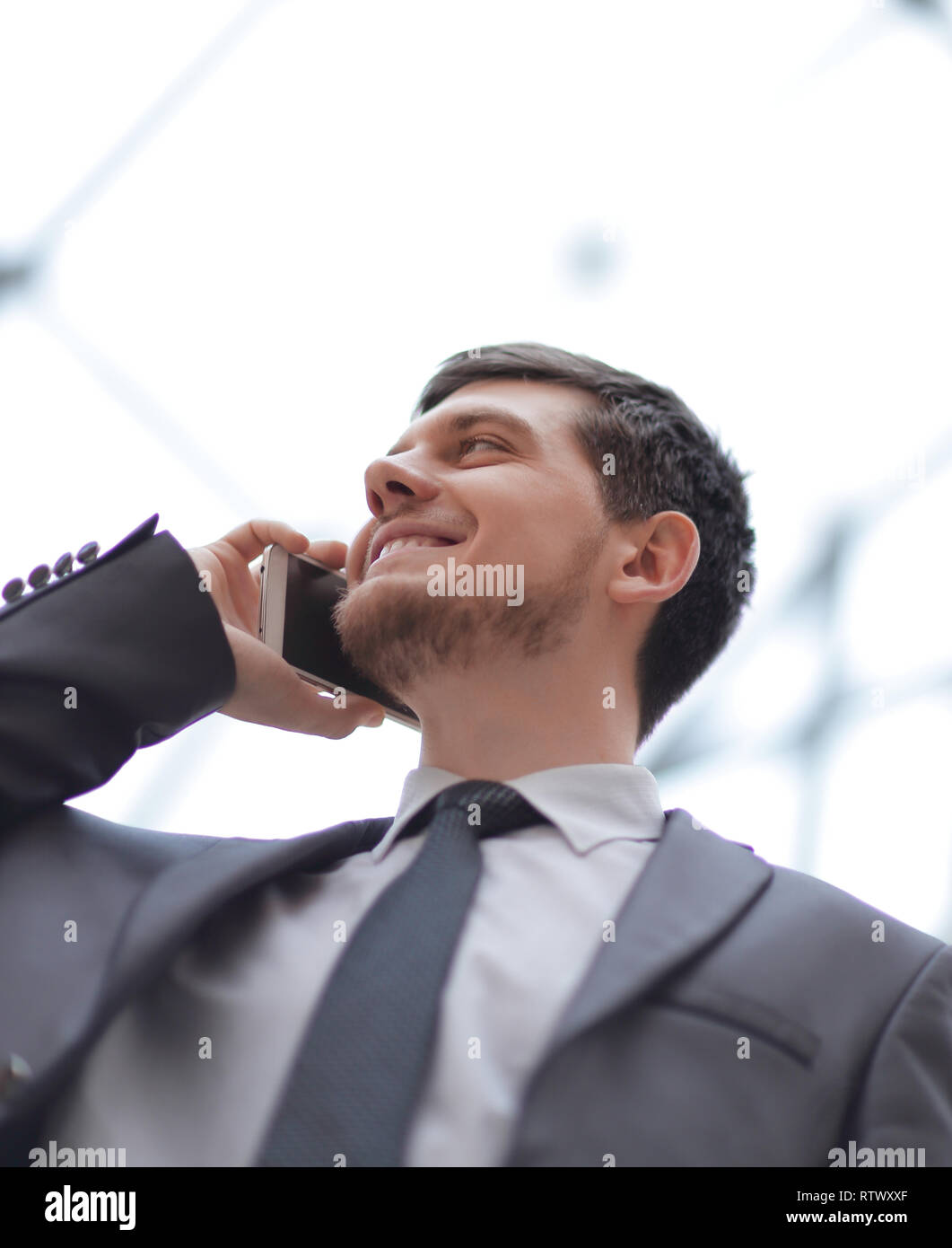 office worker listening to his phone interlocutor with concentration ...