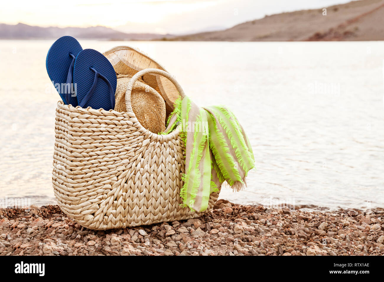 Beach Bag With Flip Flops And Hat For Summer Vacation At Lake Shore ...