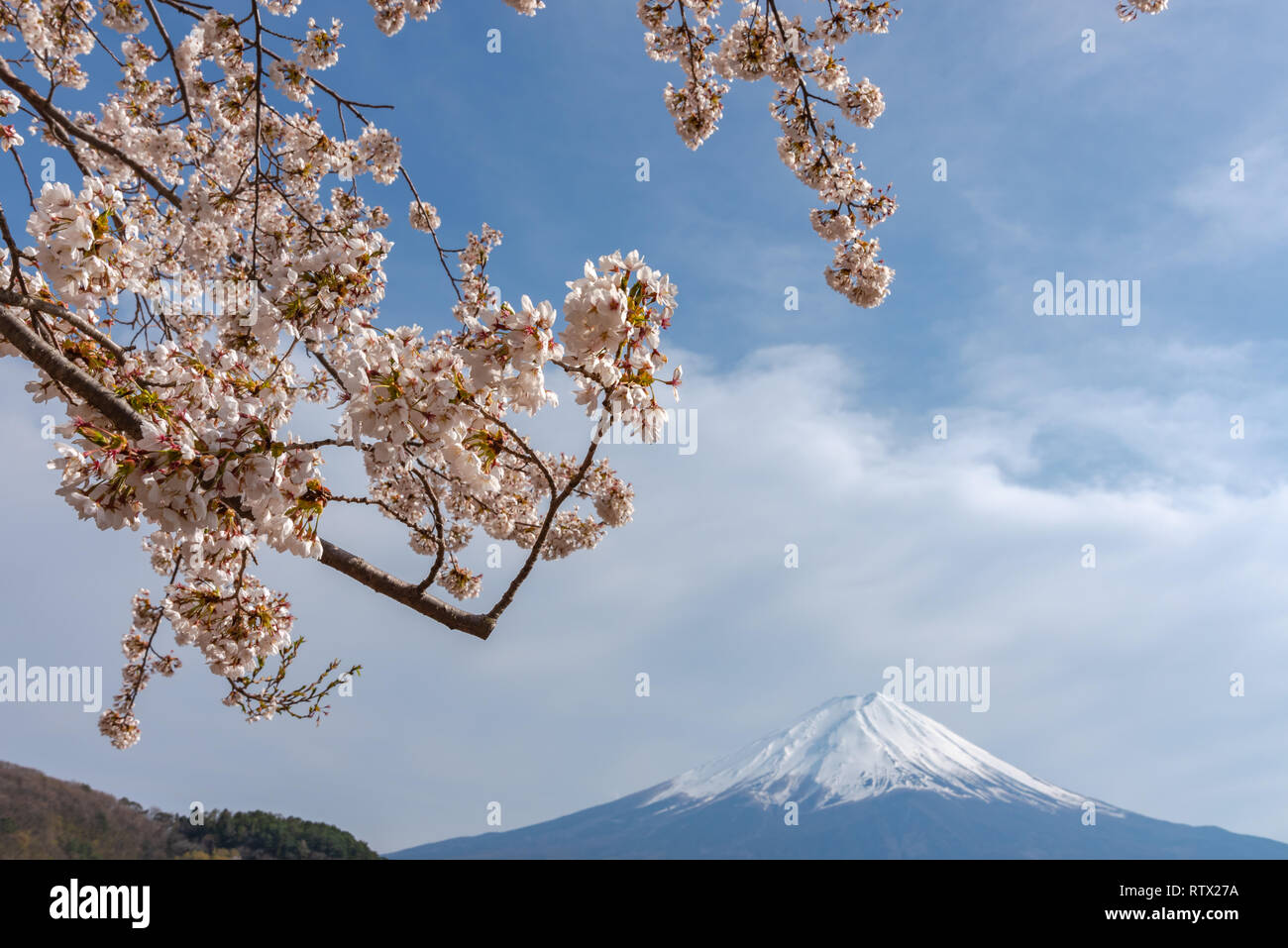 Close-up snow covered Mount Fuji ( Mt. Fuji ) with blue sky background ...