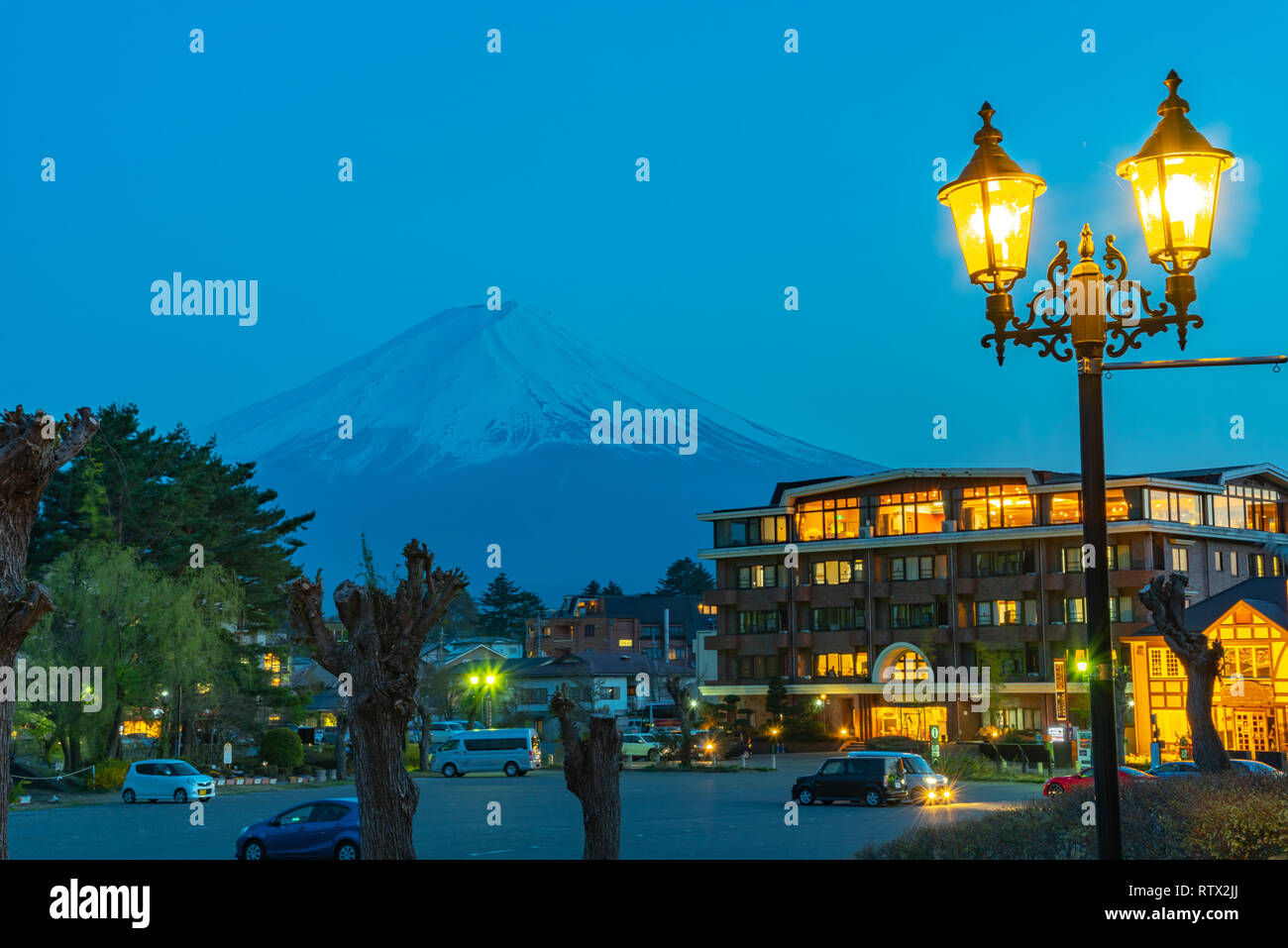 Close-up Street light and snow covered Mount Fuji ( Mt. Fuji ) with ...